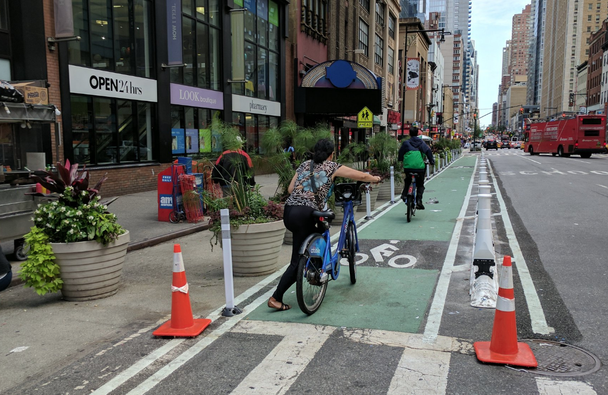 This Midtown Block Now Has a Protected Bike Lane *and* a Wider Sidewalk ...